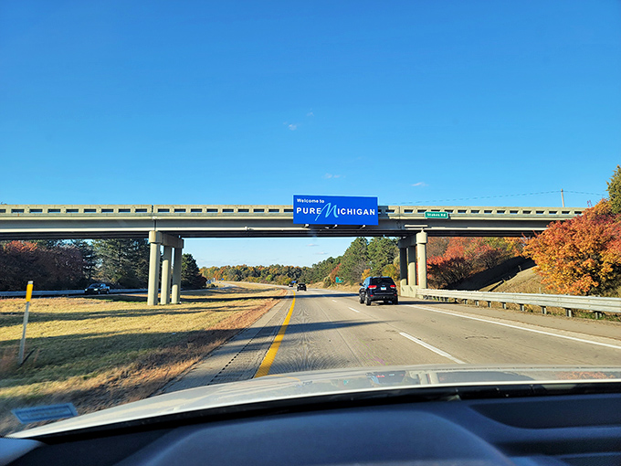 Michigan's welcome signs aren't just at ground level – this overhead greeting creates a ceremonial archway for road-trippers entering the state.