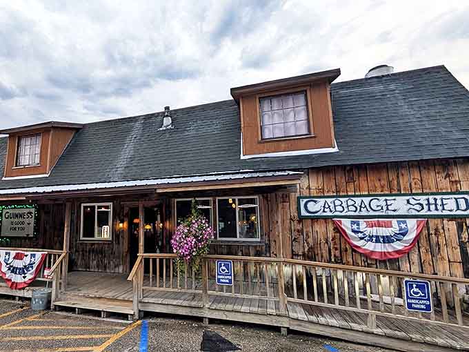 The Cabbage Shed wears its rustic charm like a badge of honor, inviting visitors to step inside where music and laughter flow freely.