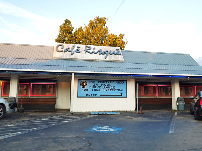 Cafe Risque stands as a roadside curiosity, its bold signage a reminder of Florida's occasionally quirky roadside attractions.