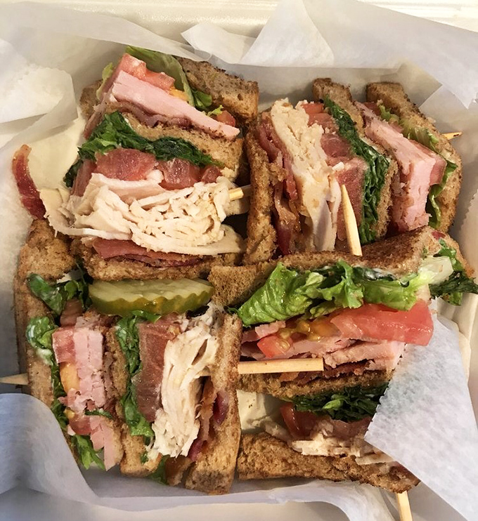 Club Sandwich: Layer upon layer of deli meats, fresh veggies, and toasted bread create a sandwich architecture that's as impressive as the Beatles' harmonies.