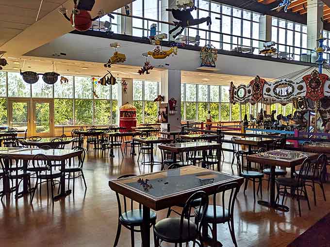 The dining areas feature whimsical decor and plenty of natural light, proving that corporate cafeterias can actually be places you want to spend time in.