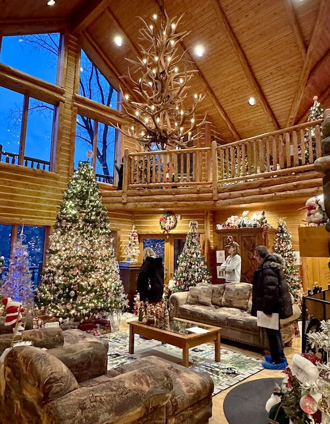 Cathedral ceilings frame the ultimate Christmas living room. That tree is so perfectly decorated it makes your family's efforts look like Charlie Brown's.