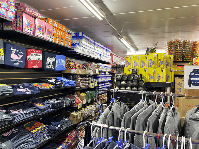 The merchandise corner offers Maine-themed souvenirs and apparel, extending the Yummies experience beyond edible treats to wearable memories.