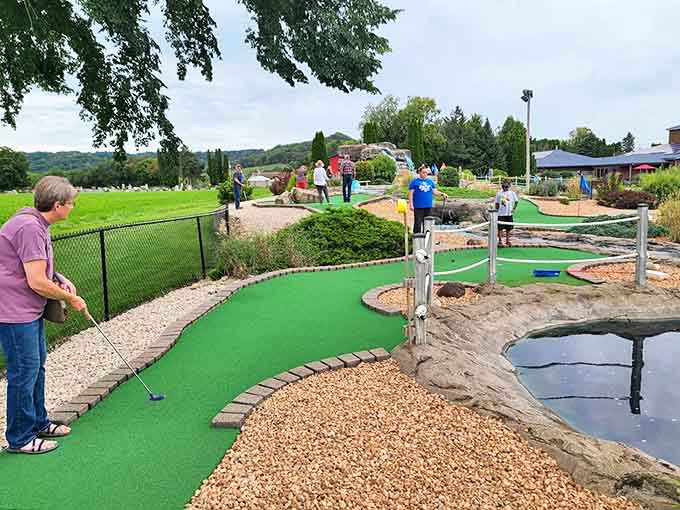 The mini-golf course offers fresh air competition amid Minnesota's natural beauty – a perfect break between indoor shopping adventures.