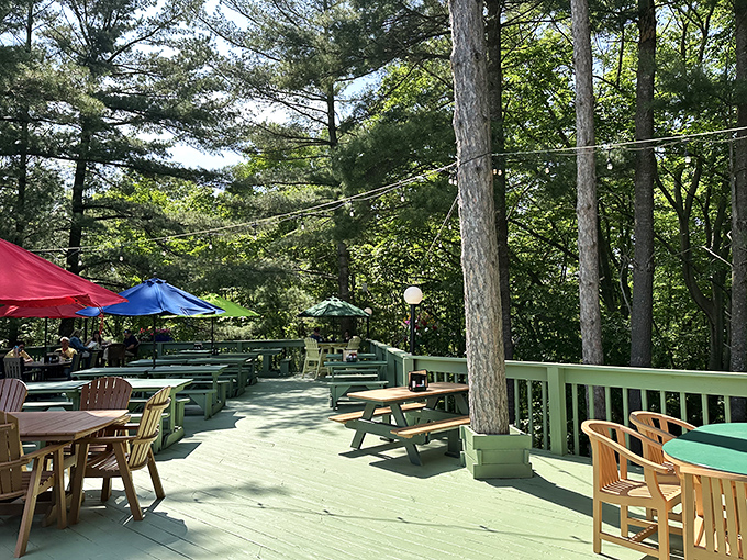 The legendary "Big Deck" where summer memories are made, cocktails are sipped, and forest breezes enhance every bite.