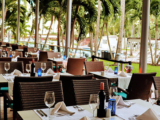 Outdoor dining where the gentle Florida breeze helps create the illusion that you have room for just one more plate.