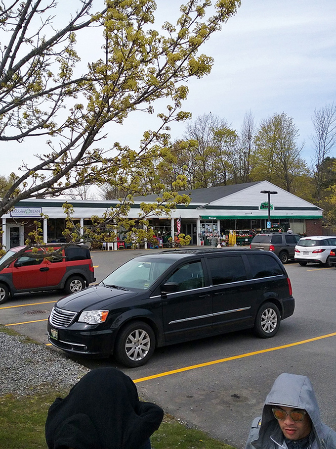 The full Renys experience awaits beyond these doors, where locals and visitors alike discover Maine's favorite shopping adventure.