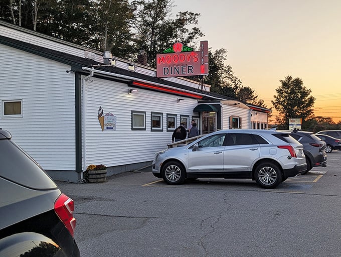 Even at sunset, the parking lot stays busy &ndash; a testament to a restaurant that's been serving satisfied customers for nearly a century.