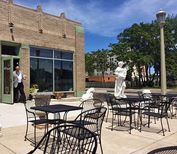 Sidewalk seating that offers front-row tickets to downtown Flint's daily rhythm, where people-watching becomes the perfect side dish to your meal.