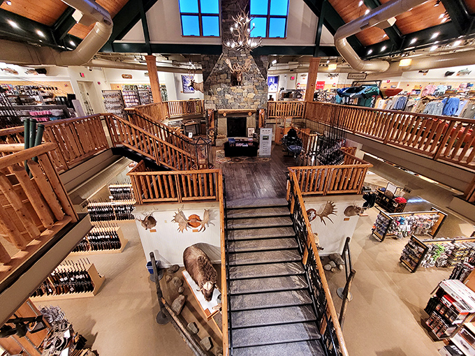 The clothing department's meticulous organization transforms shopping into a soothing experience, with every shade of outdoor-ready apparel at your fingertips.