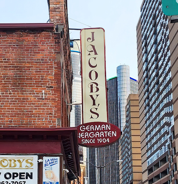 The iconic vertical sign that's guided hungry souls to German culinary bliss for generations, standing tall against Detroit's modern skyline.