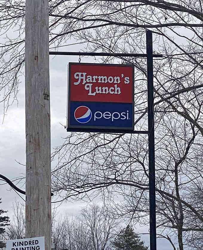 The iconic West Tampa Sandwich Shop sign stands as a beacon for sandwich lovers seeking authentic Cuban flavors.