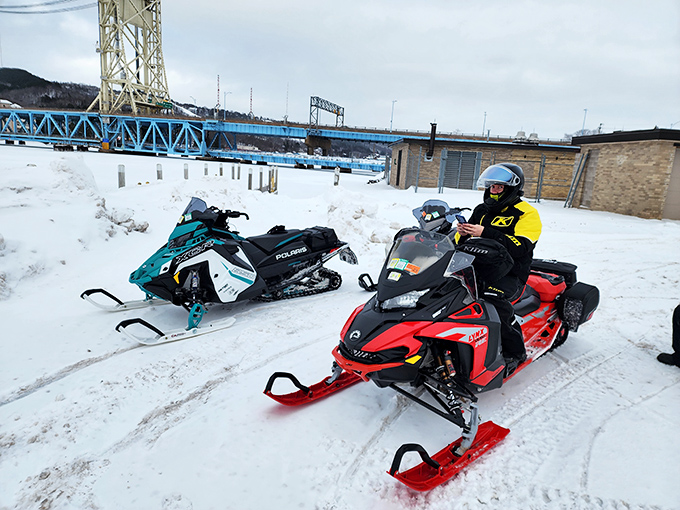 Snowmobilers embrace the "sisu" spirit of Finnish determination, exploring hundreds of miles of trails that connect Hancock to the broader Upper Peninsula.