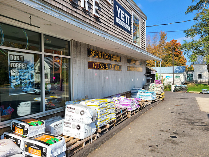 Garden supplies and soil bags create an earthy welcome mat outside the store, promising green thumbs and growing possibilities.