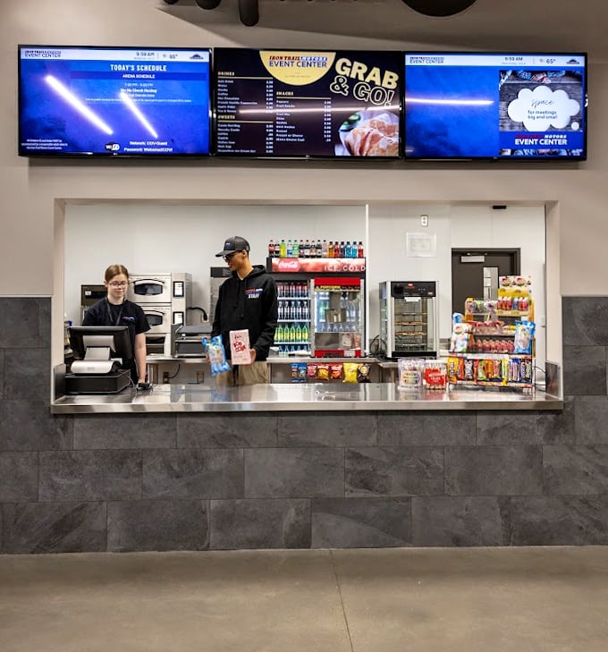 The snack counter stands ready to refuel hungry adventurers with hot chocolate that tastes even better after ice time.