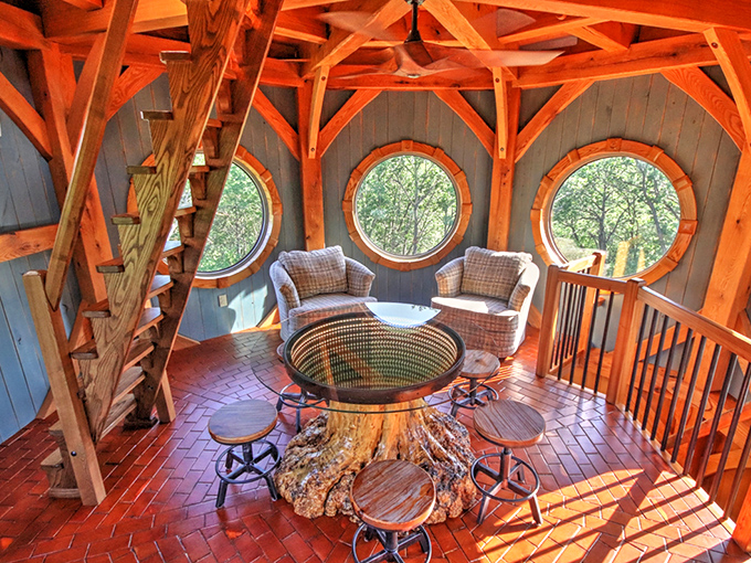 This remarkable tree-stump table anchors the dining area, bringing nature indoors in the most spectacular way possible.