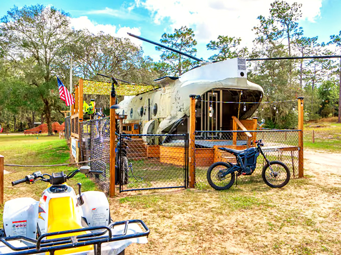 Security fencing ensures your helicopter haven remains private, though curious forest creatures might still stop by to investigate.