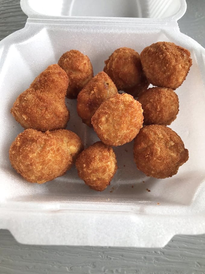 Fried mushrooms with the perfect crunch-to-squish ratio – proving vegetables can be decadent when properly introduced to hot oil.