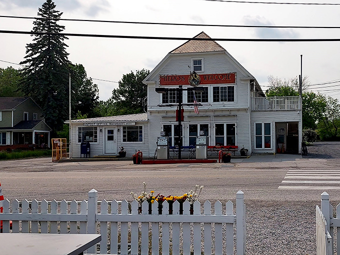 White clapboard siding and red benches create that quintessential Vermont aesthetic that can't be manufactured – only earned.