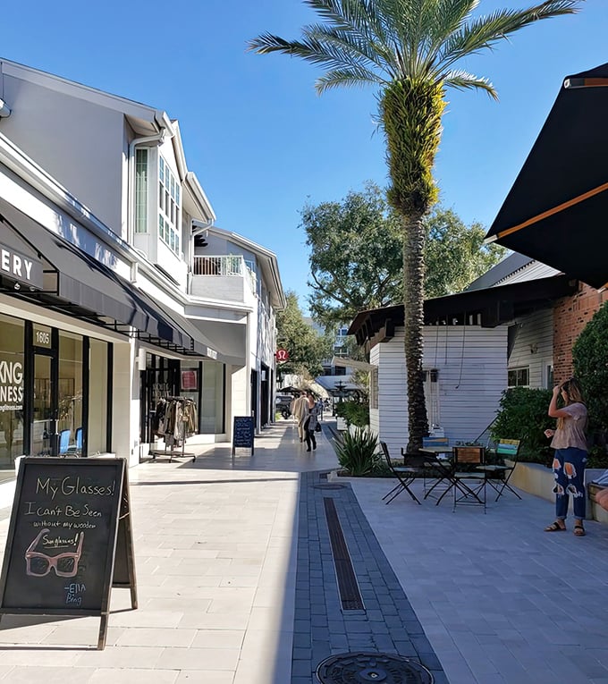 The open-air design invites gentle breezes to accompany shoppers from store to store, making climate-controlled malls seem like relics from a less enlightened retail era.