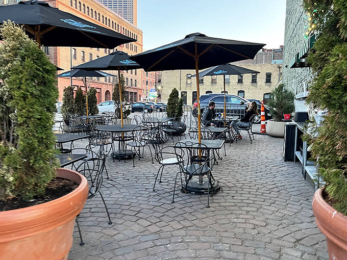 A cobblestone oasis in the urban landscape, where Minnesota's precious summer days are savored alongside those famous wings.
