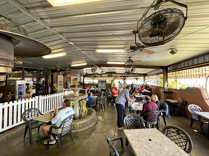 The outdoor patio &ndash; Florida's answer to an Italian piazza, where ceiling fans replace Mediterranean breezes but the joy remains the same.