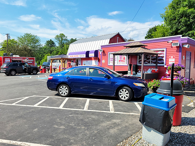 The asphalt welcome mat to seafood paradise, where hungry pilgrims gather before their flavor journey.