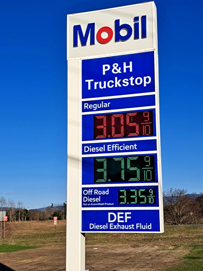 The Mobil sign stands tall, but savvy travelers know the real attraction lies inside where homemade comfort food awaits.