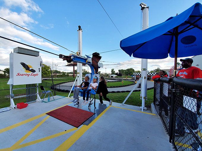 Soaring eagle ride: Adventurous souls suspended in mid-air, experiencing the closest thing to flight while those on the ground point and say, "No way I'm trying that!"