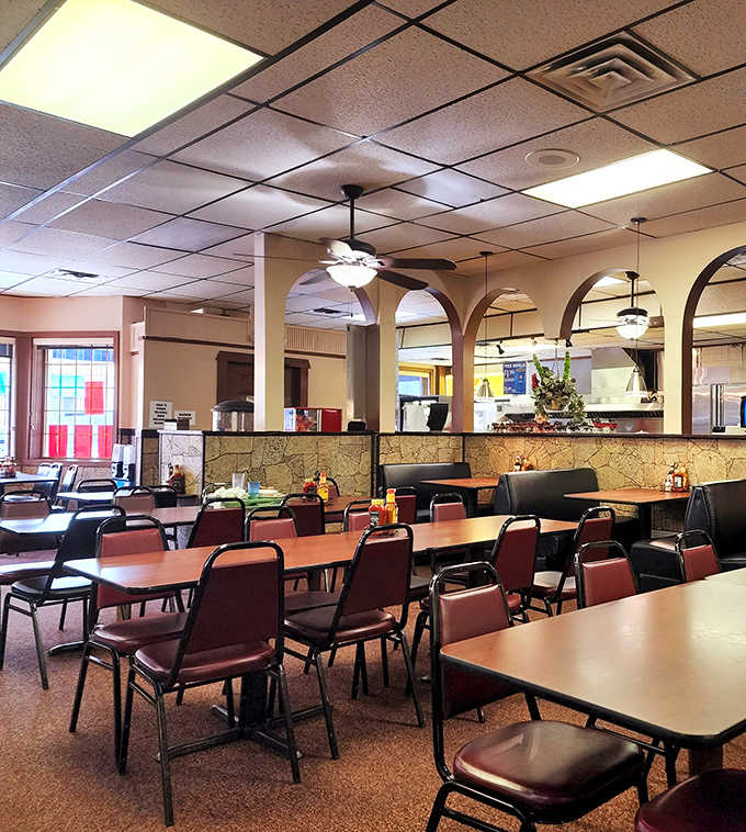 The dining area's arched doorways and comfortable seating create the perfect backdrop for the main event: seriously good steak.