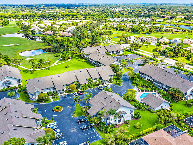 An aerial perspective of residential harmony &ndash; where golf courses and waterways create a patchwork quilt of Florida living.