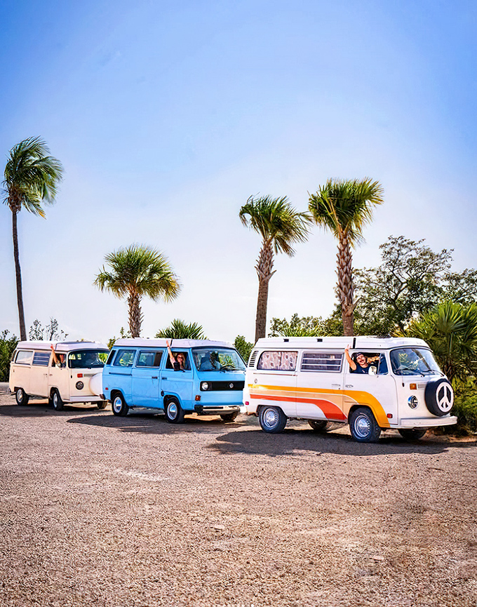 A colorful caravan of vintage vans creates an Instagram-worthy moment against the tropical Florida Keys backdrop.