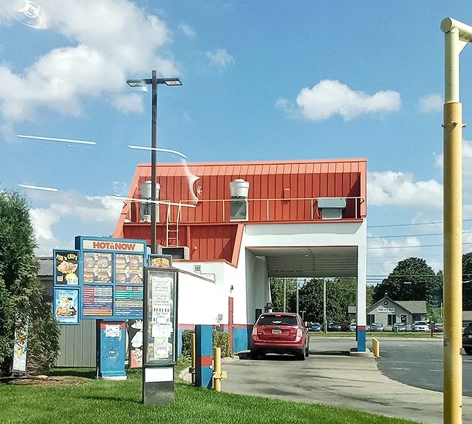 Multiple drive-through perspectives showcase a system designed for both speed and customer satisfaction.