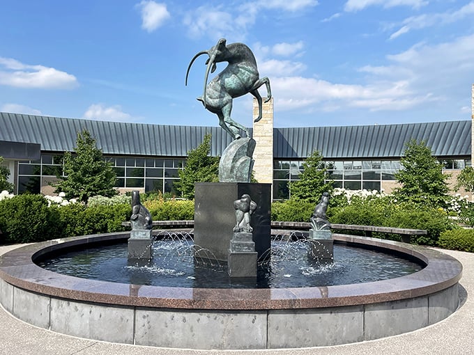 Water dances around sculptural elements in this artistic fountain, proving that even practical features can become extraordinary with creative vision.