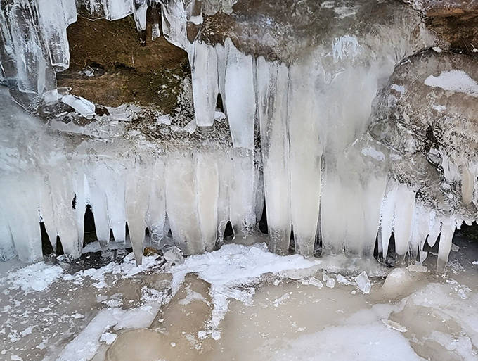 Winter's artistic touch creates delicate ice formations &ndash; these crystalline daggers hang like nature's chandeliers, catching every ray of sunlight.