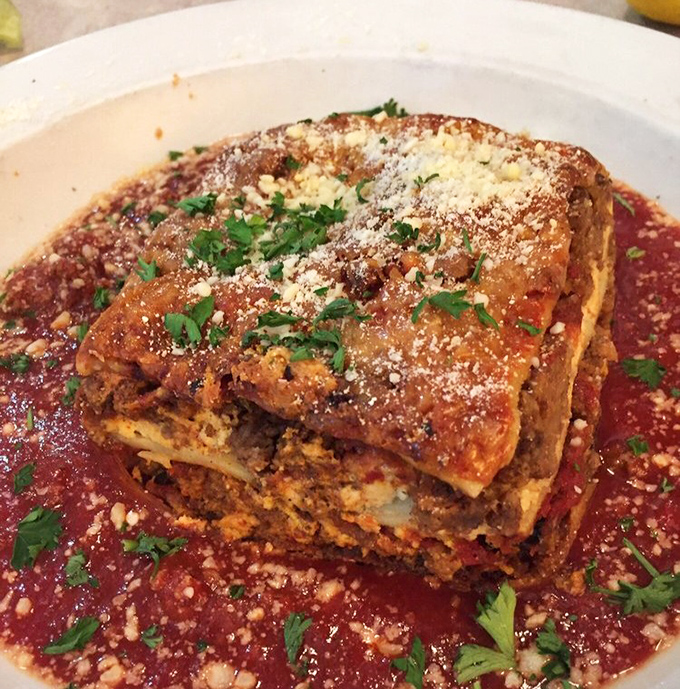Lasagna: This Italian masterpiece arrives bubbling hot in its own sea of red sauce – a comfort food classic that hits the spot like a familiar Beatles tune.