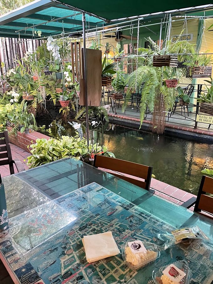 A tropical oasis where lush plants surround diners, creating the perfect backdrop for savoring Key lime treasures in paradise.