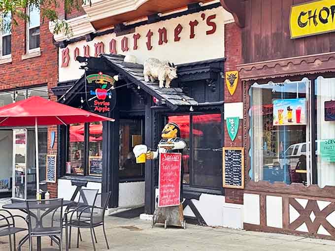 Red umbrellas offer shade for those brave enough to enjoy their aromatic sandwiches al fresco &ndash; a true test of friendship with neighboring tables.