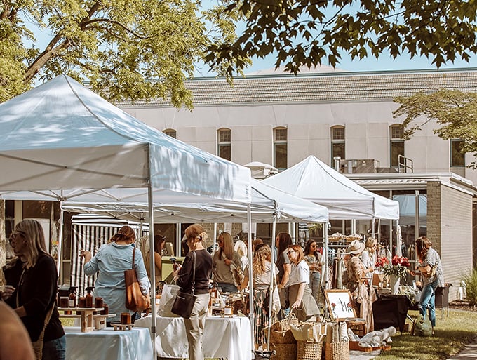 Peddlers' Market transforms ordinary spaces into bustling bazaars where artisans and treasure-hunters meet under summer skies to celebrate community commerce.