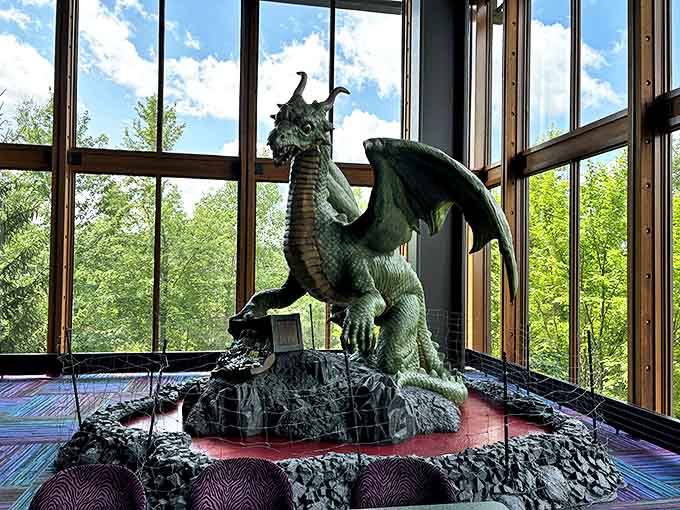 Even the decorative sculptures embrace the fantasy theme, with dragons and mythical creatures standing guard as if protecting the realm from boring architecture.