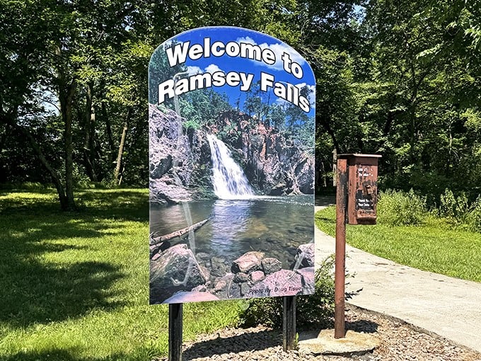 Welcome signs promise waterfall adventures ahead, setting expectations appropriately high for the natural wonders waiting just beyond this cheerful greeting.