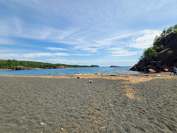 Another angle reveals how the beach's unique geography creates protected coves and dramatic rock formations that make every visit feel like exploration.