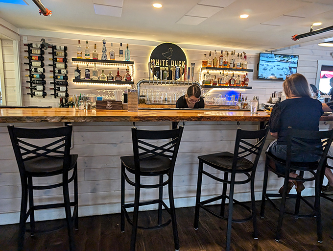 The bar area balances rustic charm with polished service &ndash; a welcoming spot where crafted cocktails and local brews complement the kitchen's creations.