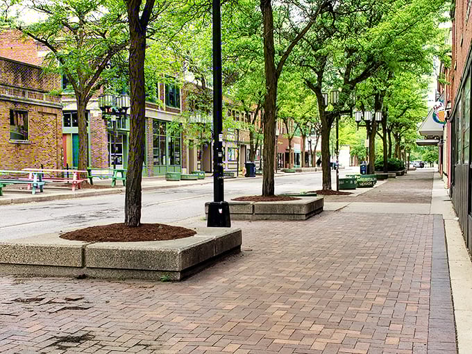 Tree-lined sidewalks and brick pavers create a pedestrian-friendly downtown where shoppers can stroll between unique local businesses.