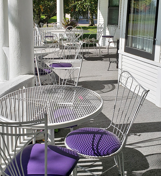 Dining al fresco takes on new meaning when your table sits on a historic porch overlooking a collection of vintage railroad cars.