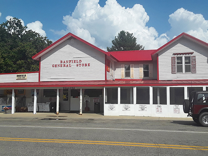 The unassuming exterior belies culinary treasures within. This modest red building houses pizza worth driving miles of country roads to find.