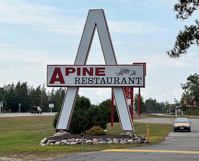 The roadside sign stands tall and proud, a beacon for hungry travelers who know that the best dining experiences often hide in plain sight.