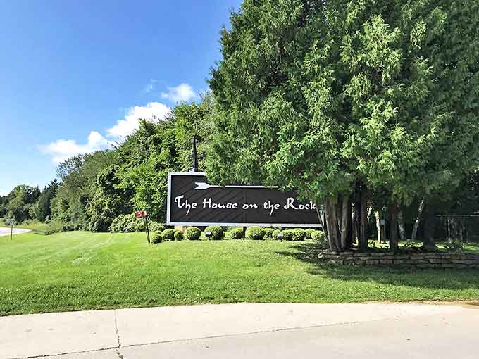 The simple black sign points the way to extraordinary experiences, an understated introduction to the wonderland that awaits beyond.