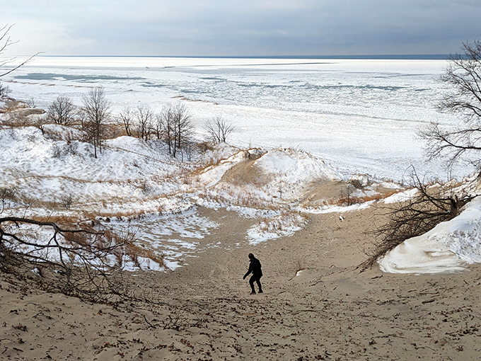 Even in winter's embrace, determined souls brave the elements, knowing seasonal storms might uncover extraordinary glass treasures.
