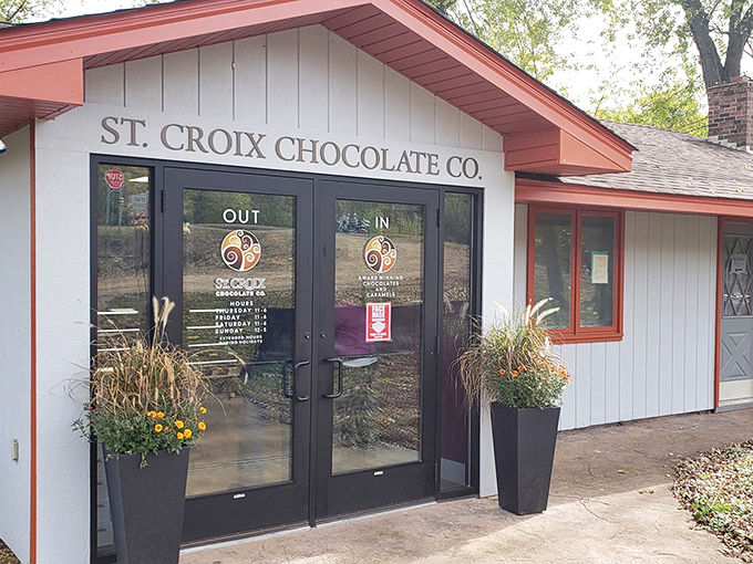 The storefront welcoming visitors with cottage charm and professional polish, that perfect balance between approachable small-town friendliness and serious artisan credibility.